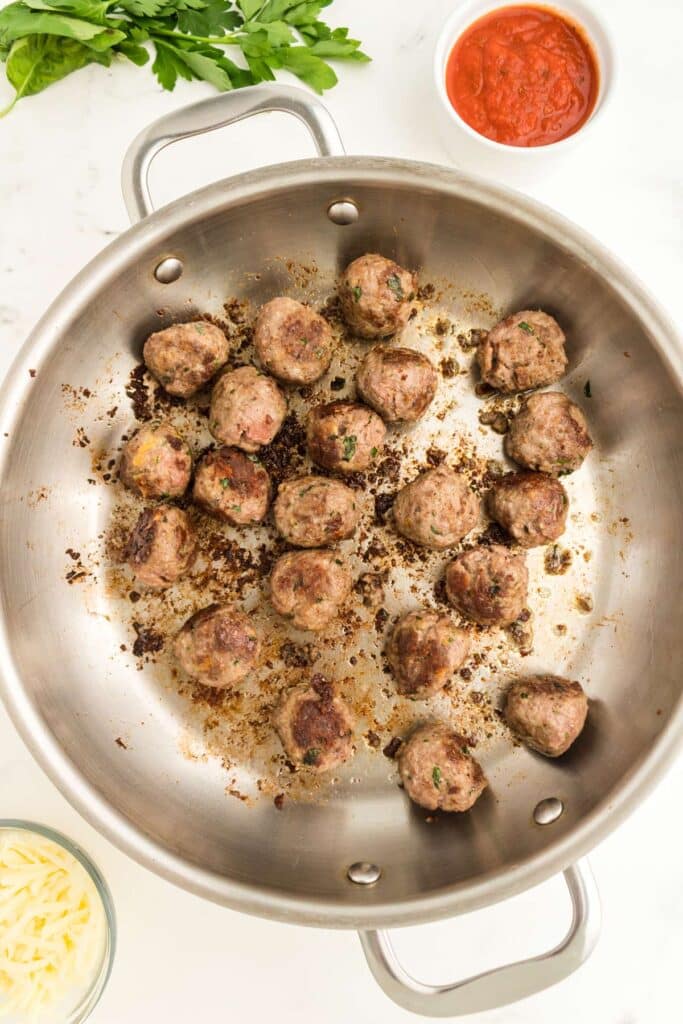 Cheesy Meatballs - Girl Gone Gourmet